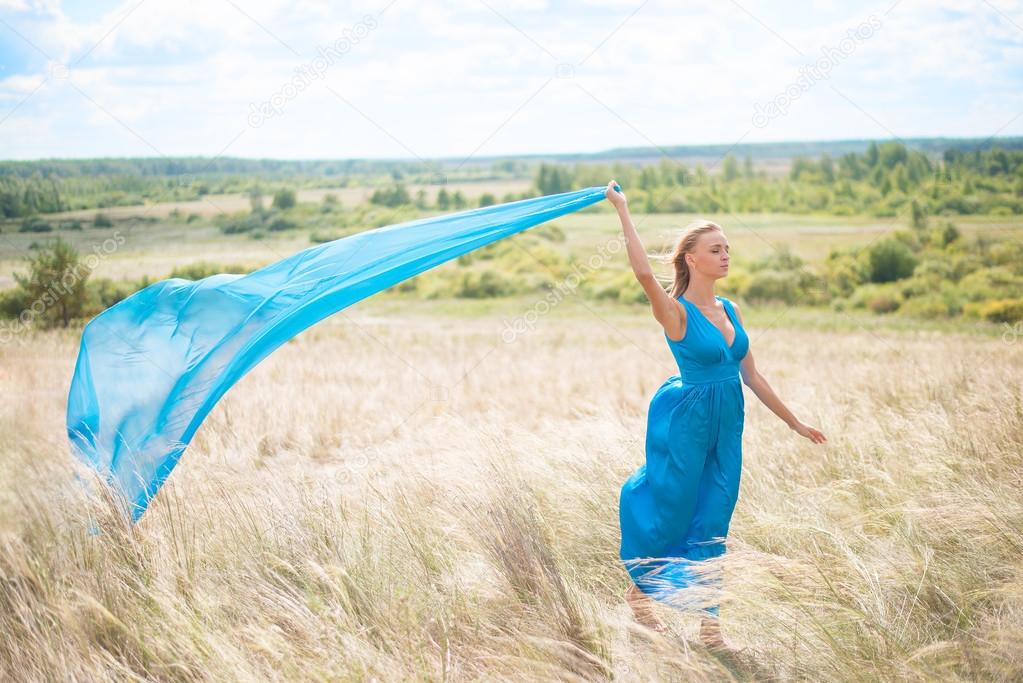 Girl with flying blue cloth — Stock Photo © borjomi88 #117218746