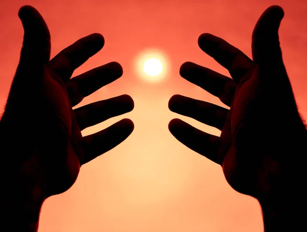 Sun in hands Stock Photos, Royalty Free Sun in hands Images | Depositphotos