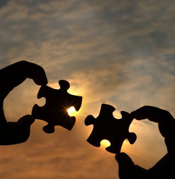 Two Hands Connecting Puzzle Pieces Sky Background Jigsaw Wooden Puzzle ...