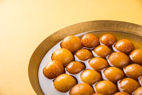 Gulab jamun, or gulaab jamun, is a milk-solids-based sweet mithai ...