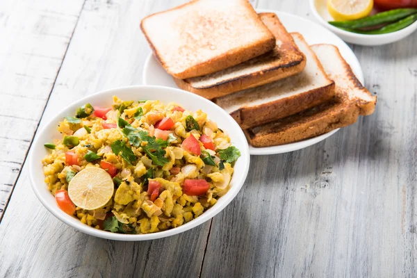Masala Anda Bhurji of egg bhurji or Spicy scrambled eggs with bread ...