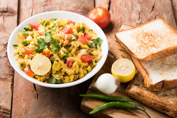 Masala Anda Bhurji of egg bhurji or Spicy scrambled eggs with bread ...