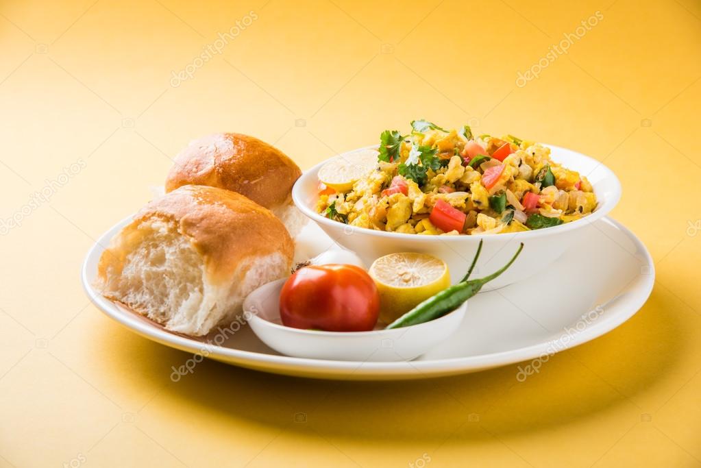 Masala Anda Bhurji of egg bhurji or Spicy scrambled eggs with bread or ...