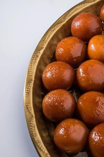 Gulab jamun, or gulaab jamun, is a milk-solids-based sweet mithai ...