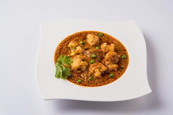 Gobi masala, gobi mutter curry or gobi fry masala, cauliflower mutter ...
