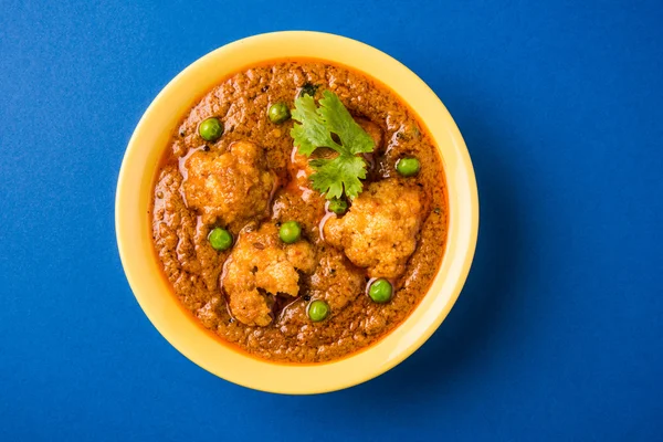 Gobi masala, gobi mutter curry or gobi fry masala, cauliflower mutter ...