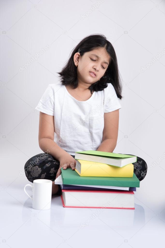 Education and home concept - stressed student girl with books, indian ...
