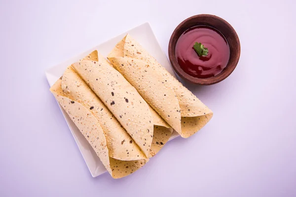 Rosted papad or roll papad, indian traditional started food or side ...