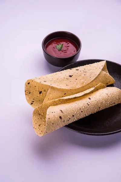 Rosted papad or roll papad, indian traditional started food or side ...