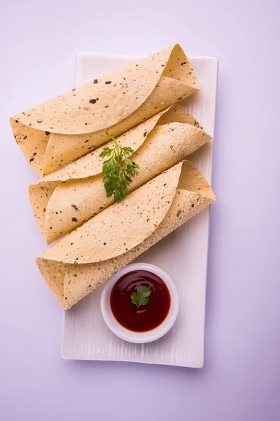 Rosted papad or roll papad, indian traditional started food or side ...