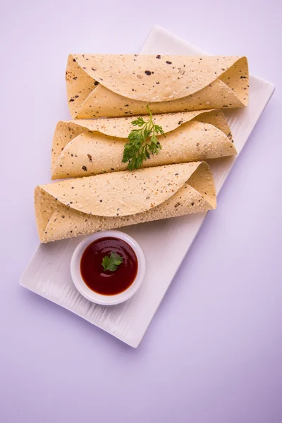 Rosted papad or roll papad, indian traditional started food or side ...
