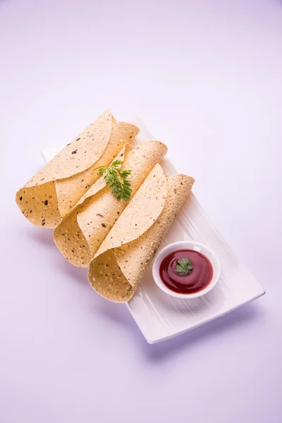 Rosted papad or roll papad, indian traditional started food or side ...