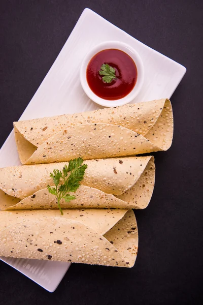 Rosted papad or roll papad, indian traditional started food or side ...