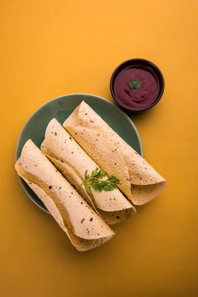 Rosted papad or roll papad, indian traditional started food or side ...