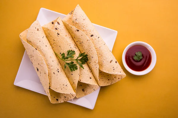 Rosted papad or roll papad, indian traditional started food or side ...