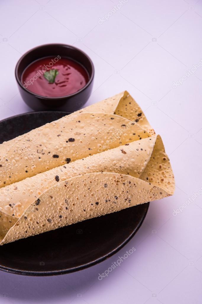 Rosted papad or roll papad, indian traditional started food or side ...