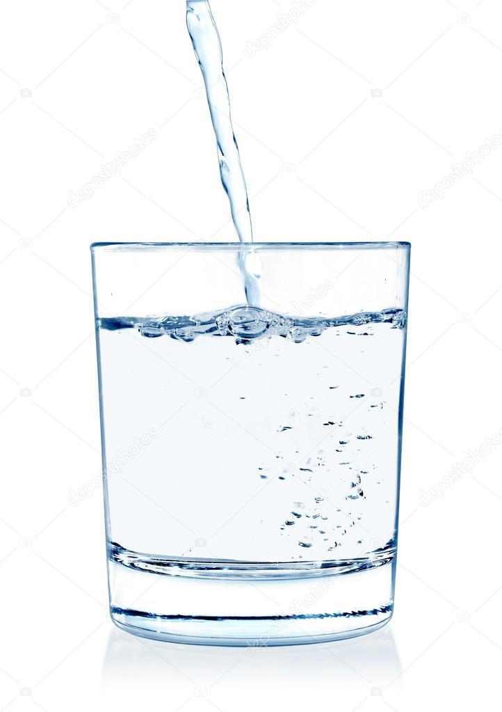 Clear water being poured into a glass cup isolated on white background ... Clear water being poured into a glass cup isolated on white background ...