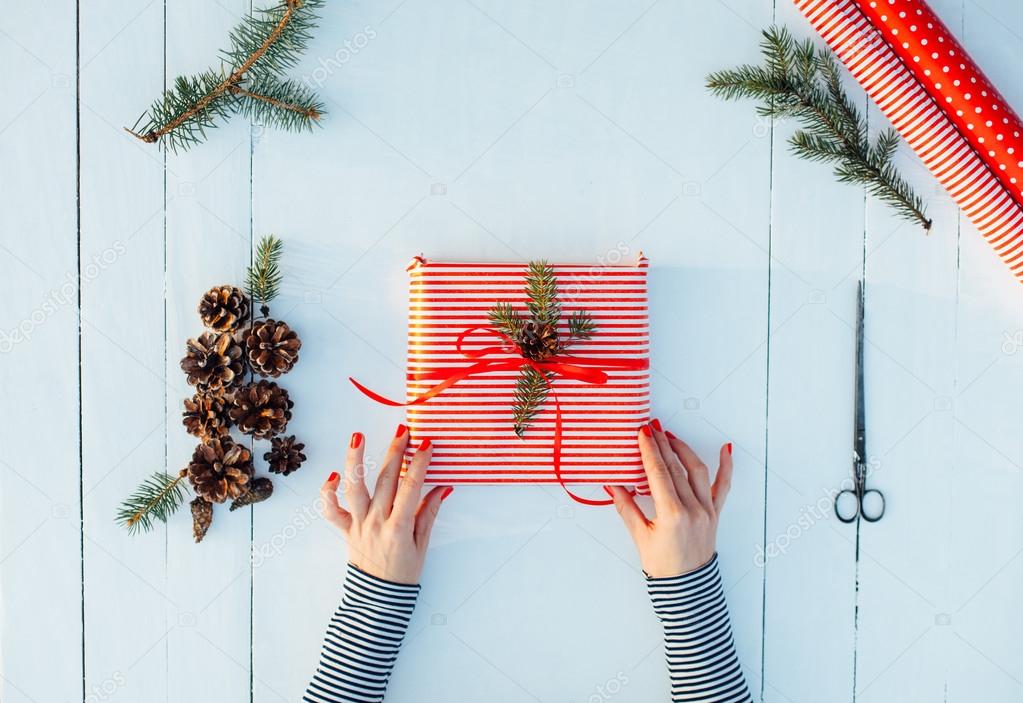 Woman packing gift, step by step — Stock Photo © kikovic #93140454