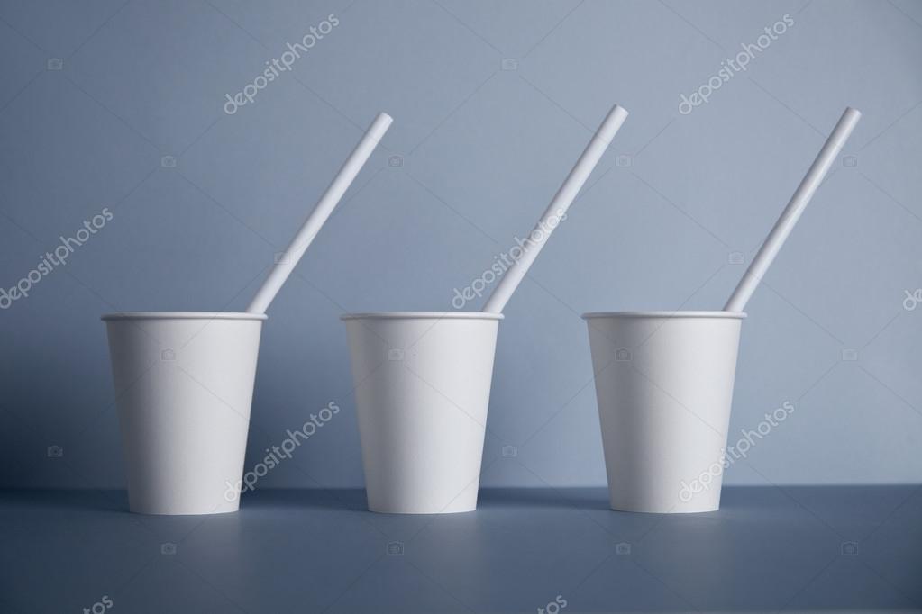 Three take away white paper cups Stock Photo by ©derepente 113850146