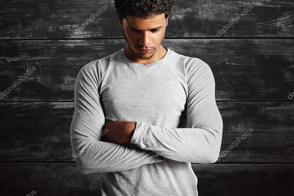 Model with arms crossed and looking down — Stock Photo © derepente ...