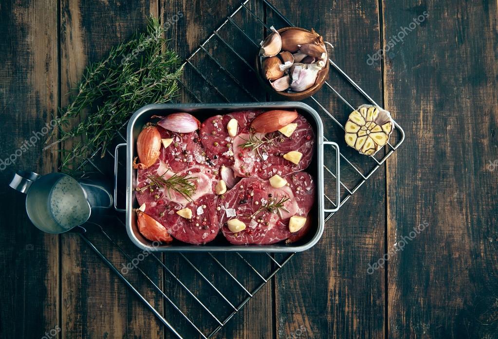 Top view of meat in steel pan ready to cook in oven — Stock Photo ...