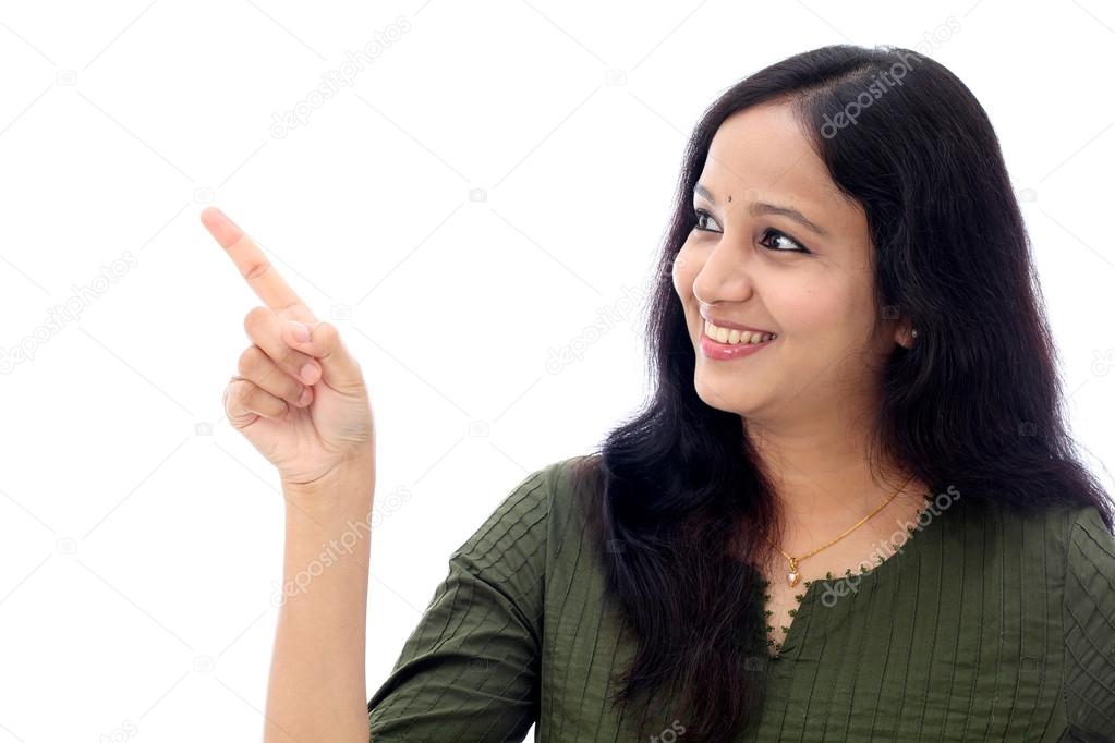 Smiling young woman showing blank copy space — Stock Photo © godsandkings #94312830
