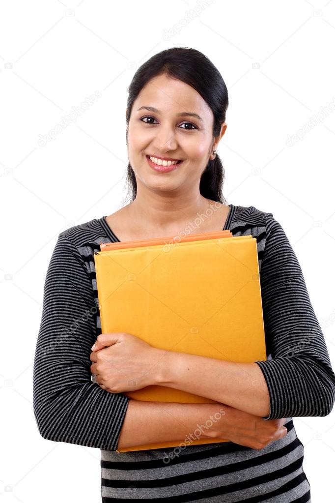 Female student holding books — Stock Photo © godsandkings #94385584 Female student holding books — Stock Photo © godsandkings #94385584