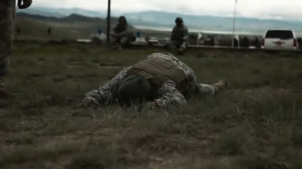 Soldier crawling under barbed wire at an obstacle course Stock Video ...