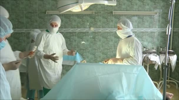 Medical team performing operation — Stock Video © operator1975 #92639752