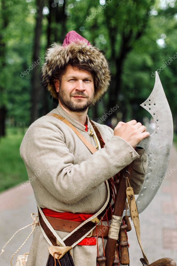 Cosaco de la ciudad 1ª mitad del siglo XVII. En un caftán, un sombrero ...