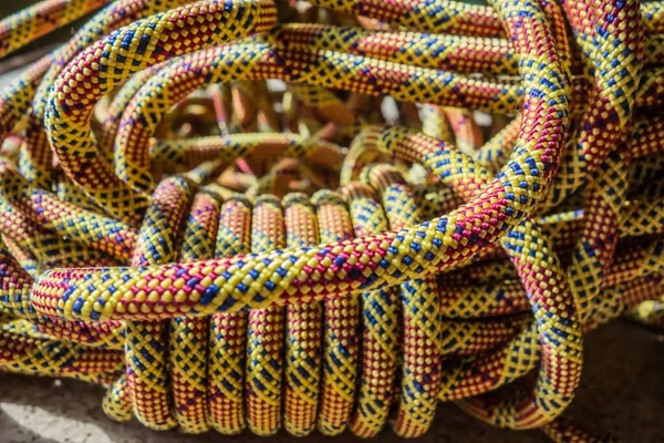 Multi-colored rock climbing ropes in bundles. Macro detail of a nylon ...