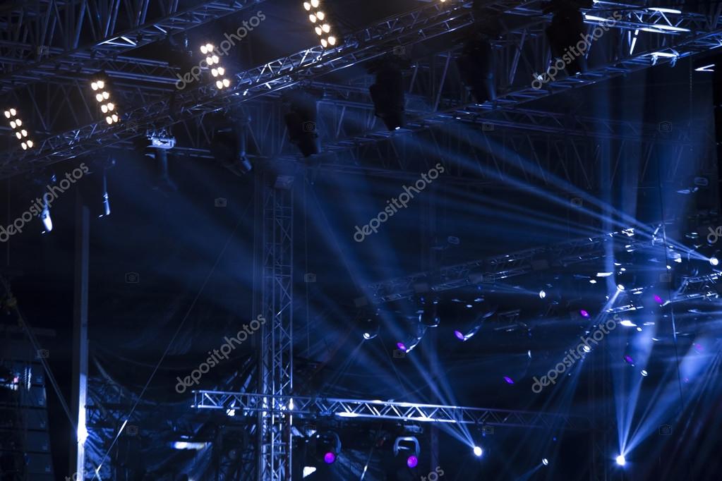 Blue stage lights Stock Photo by ©TeodoraD 114975296