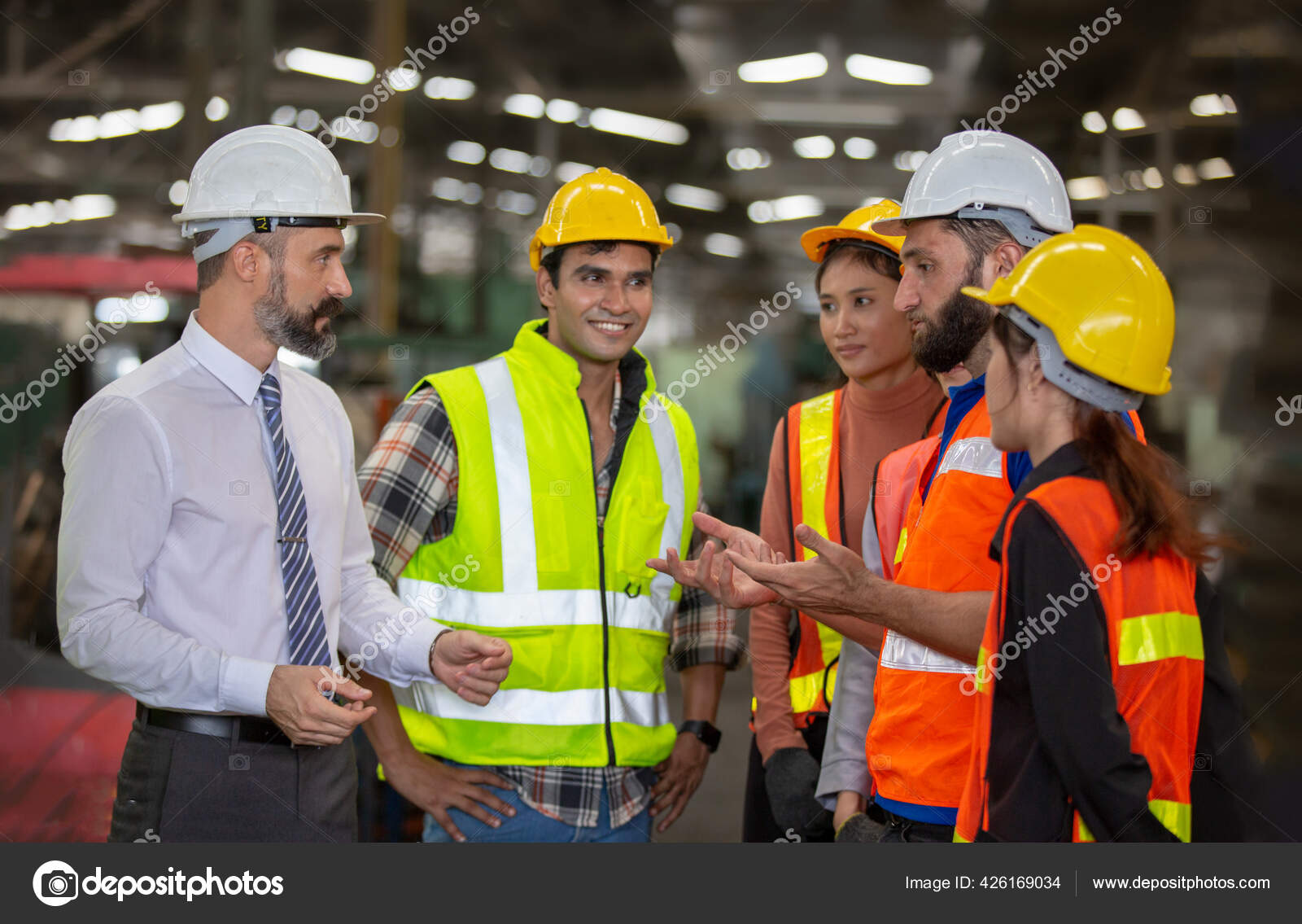 Group Engineer Manager Factory Workers Team Standing Production Line ...