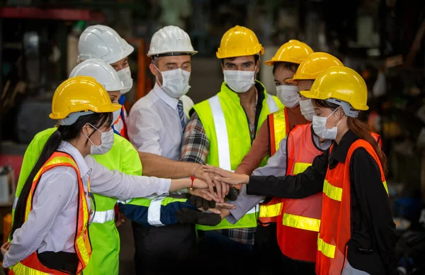 Group of Engineer manager and Factory Workers Team standing against ...