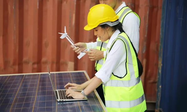 technicians install panels Solar cells to produce and distribute ...