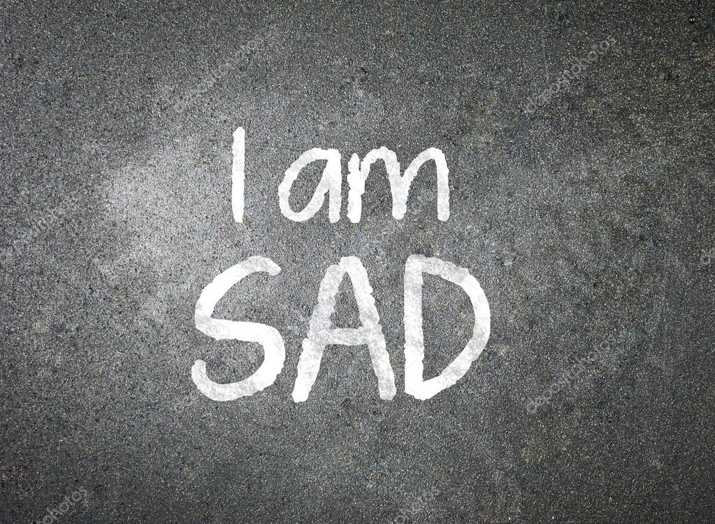 I am Sad handwritten with white chalk on a blackboard. — Stock Photo ...