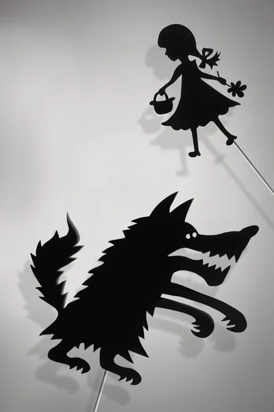 Shadow puppets of Red Riding Hood and Wolf - Stock Image - Everypixel