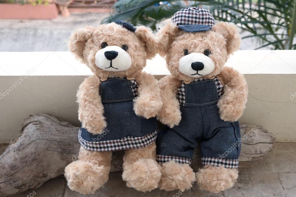 Two Teddy Bears Holding Hands