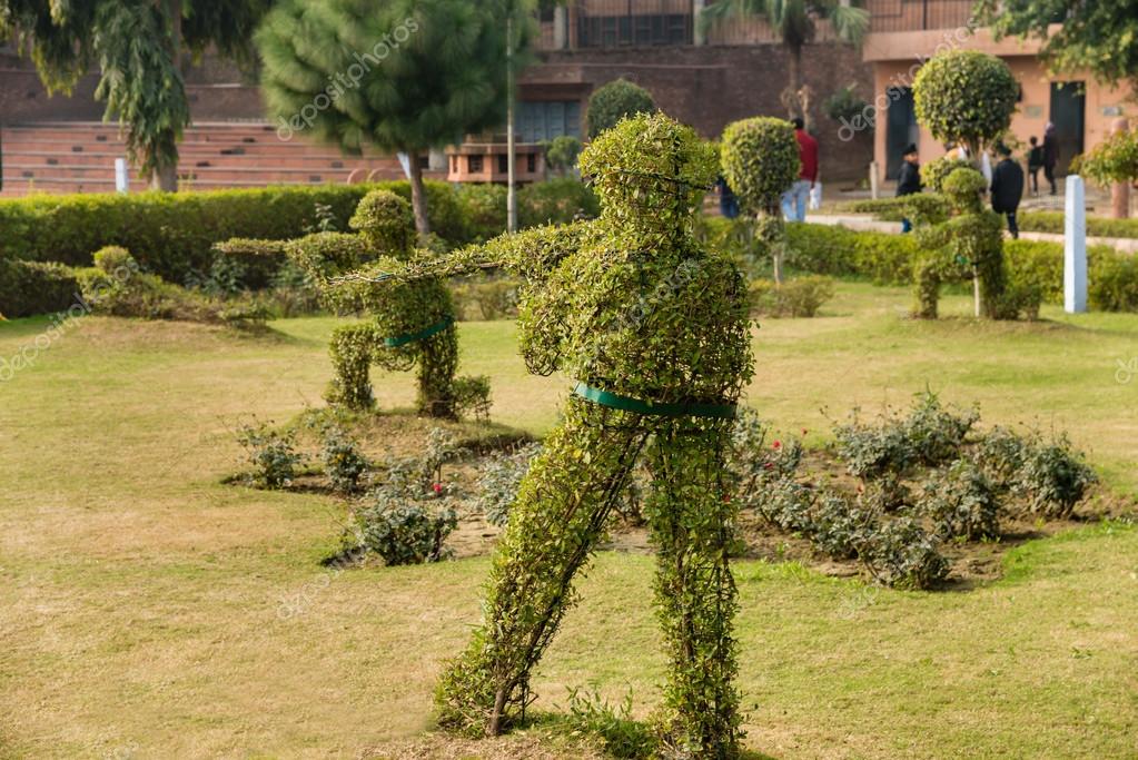 Topiary hedge figures — Stock Photo © Cornfield #92545026