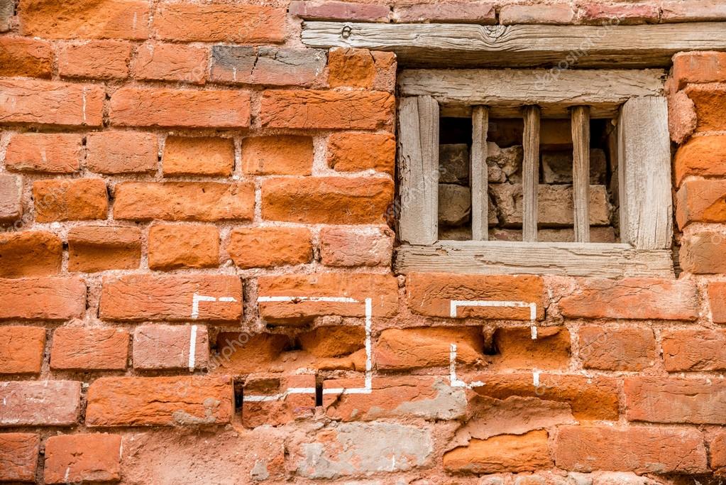 Marks on the wall where bullets struck — Stock Photo © Cornfield #92545140
