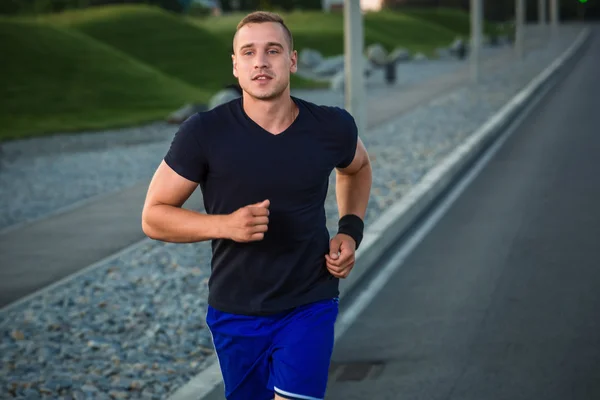 Close-up portrait of athletic man running - Stock Image - Everypixel