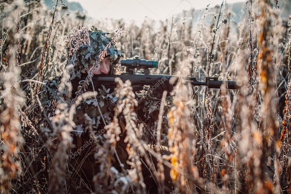 Sniper in high grass. Stock Photo by ©Dmitry_Schekochihin 88812638