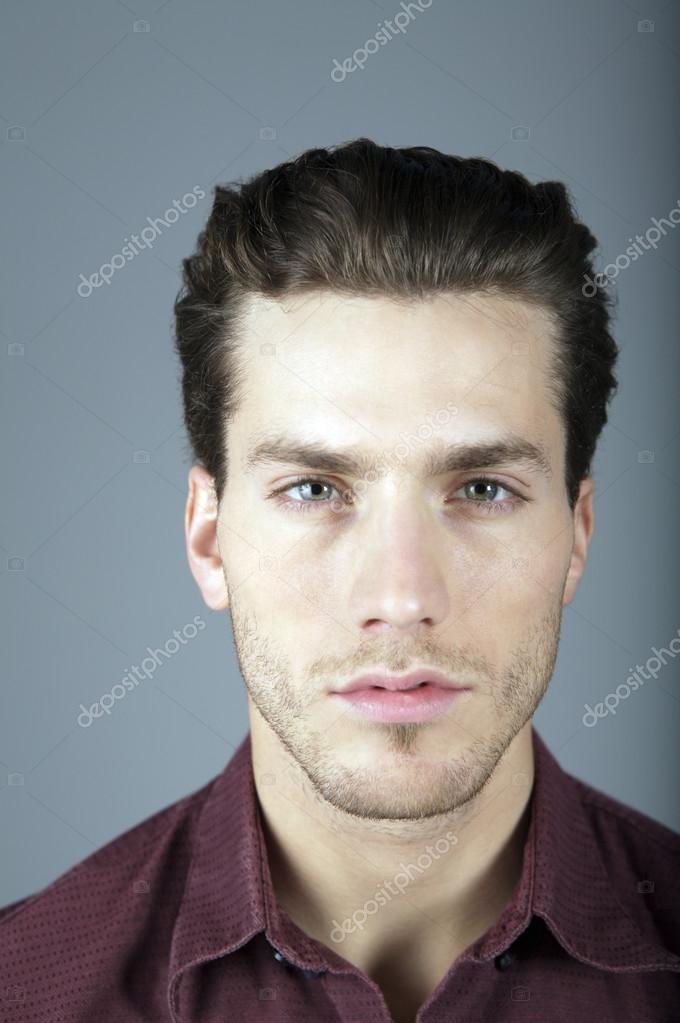Portrait of handsome young man Stock Photo by ©Focusarg 93806152