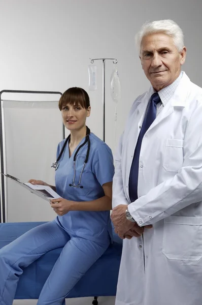 Two generations of doctors — Stock Photo © Focusarg #93908574