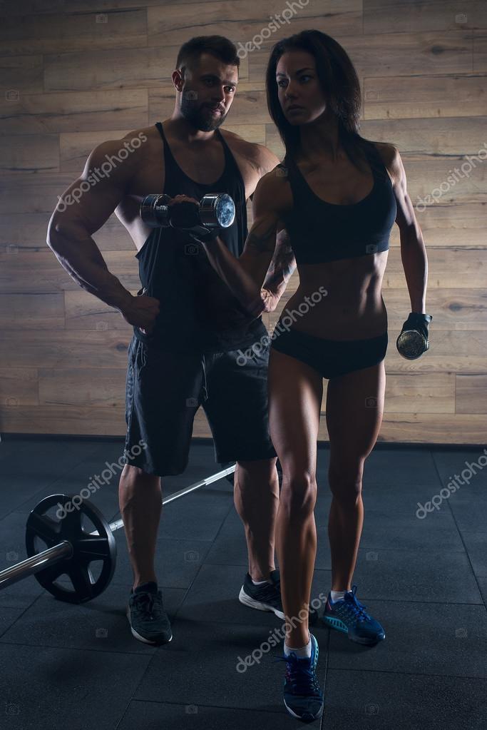Muscular man with beard and beauty girl posing Stock Photo by ...