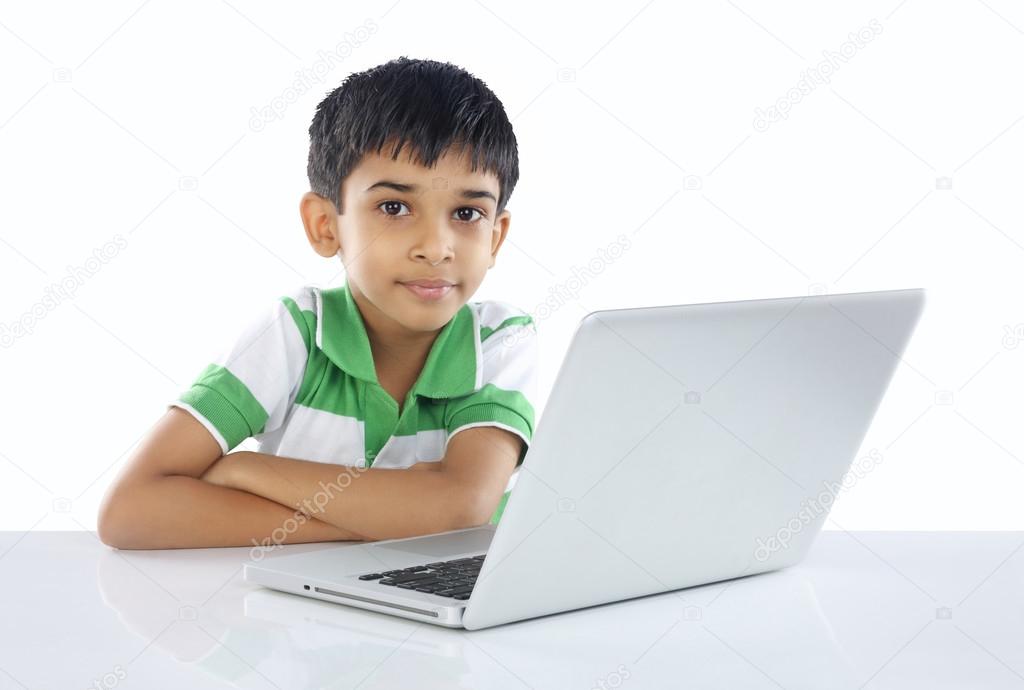 Indian School Boy with Laptop Stock Photo by ©shyamala 105892940