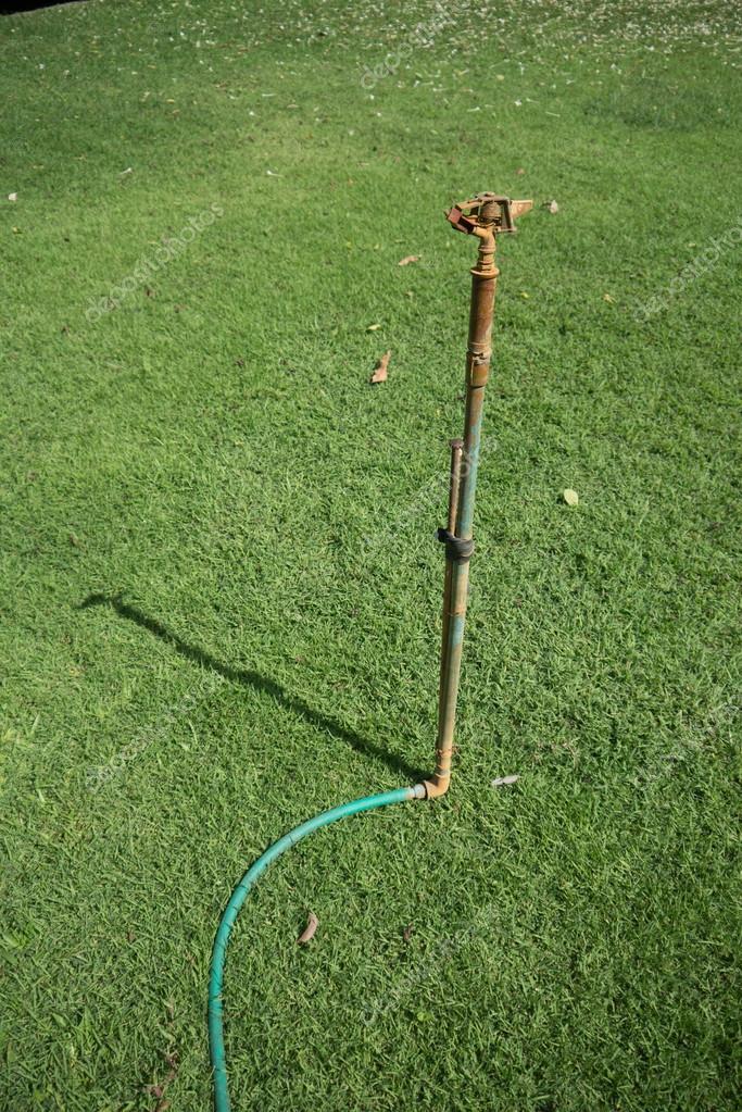 Brown rusty sprinkler Stock Photo by ©BonNontawat 104961742