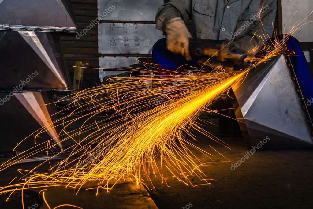Sparks while grinding iron — Stock Photo © fanjianhua #88675650