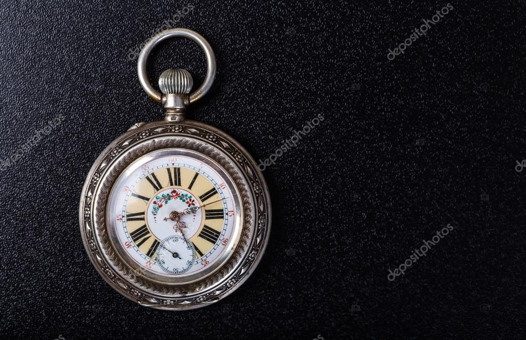 Old pocket watch on a black table — Stock Photo © bukhta79 #121649640