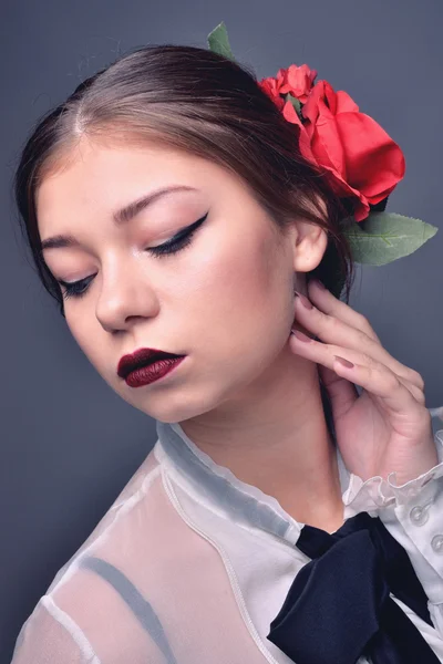 Beautiful young model with bright makeup and sunburn skin Evening make ...